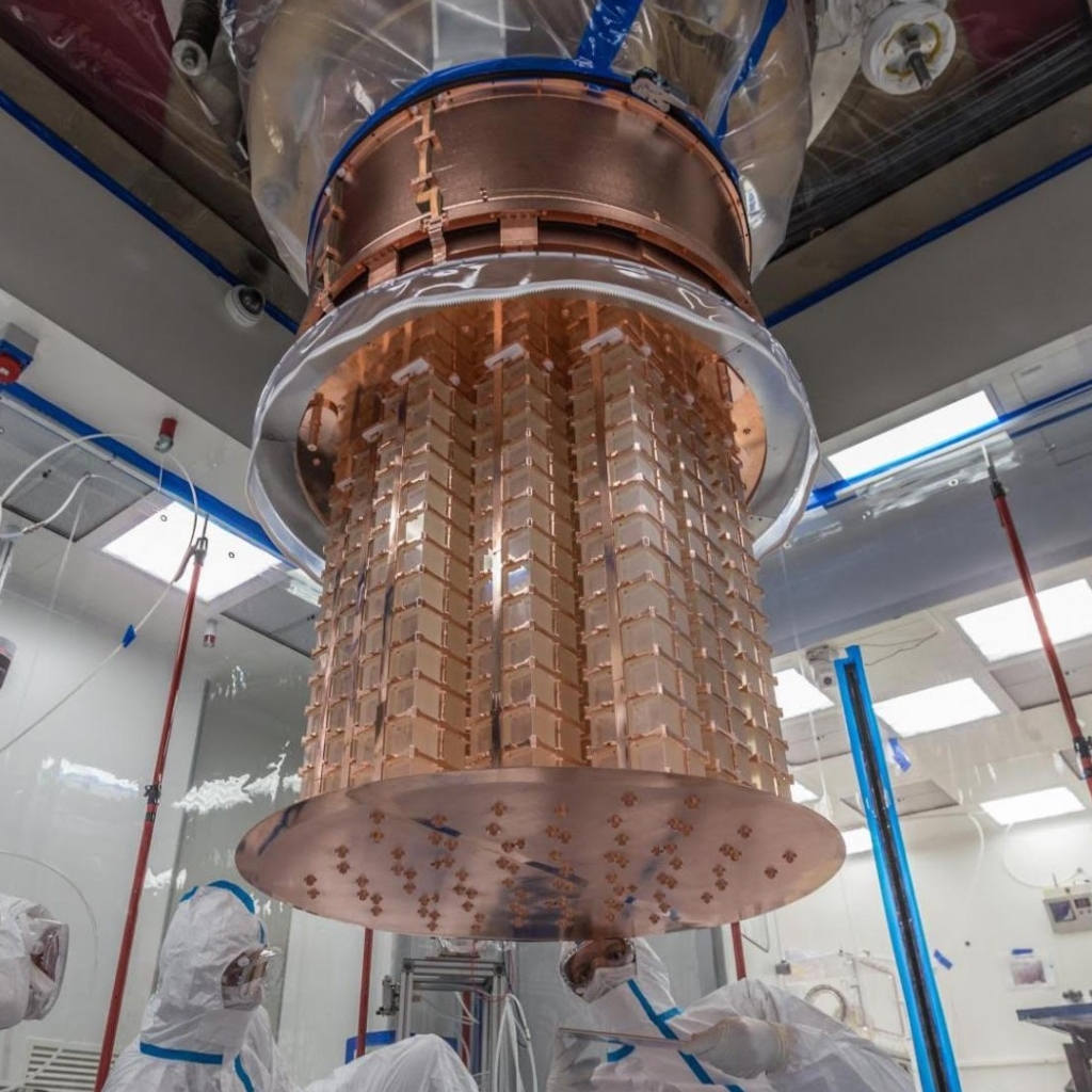 Exploring the mystery of neutrino mass using cryogenics deep under a ...